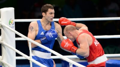 How To Defend And Counter The Overhand Right In Boxing - Evolve University